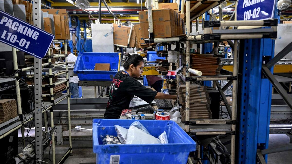 Têxtil e joalharia são os setores mais atingidos pelas tarifas dos EUA impostas à Índia - JN